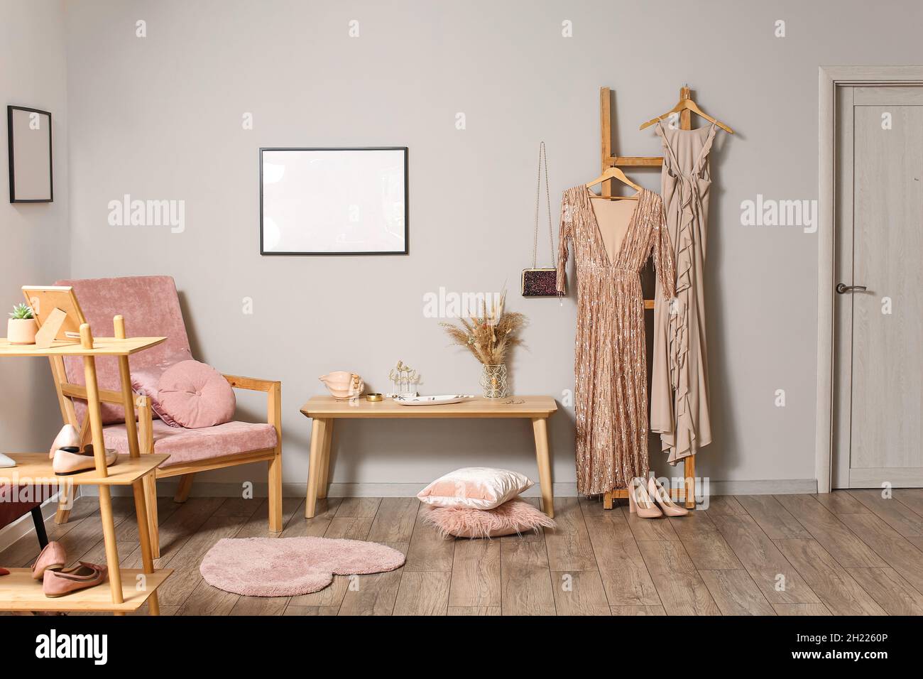 Interior of stylish room with clothes Stock Photo - Alamy