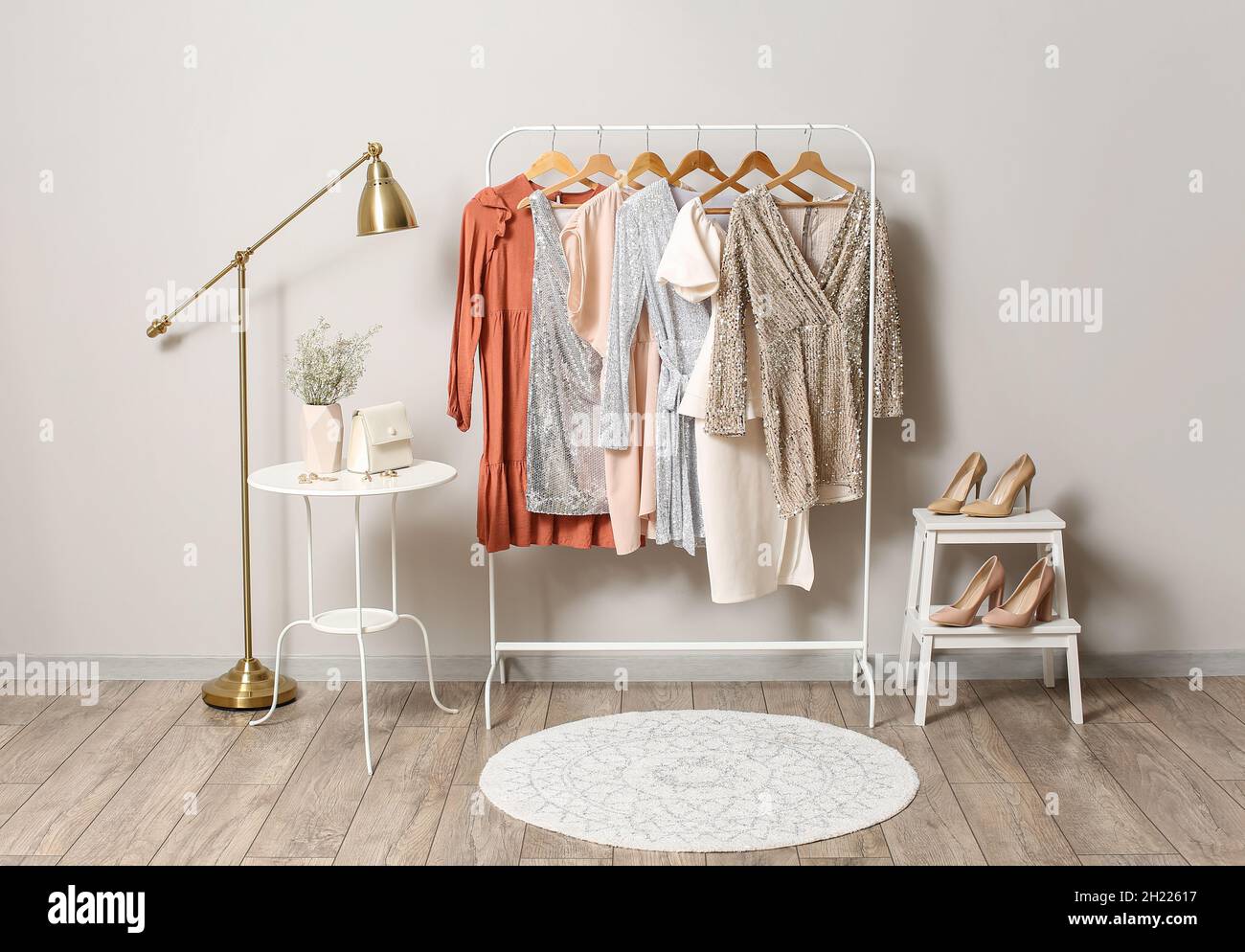 Interior of stylish room with clothes Stock Photo - Alamy