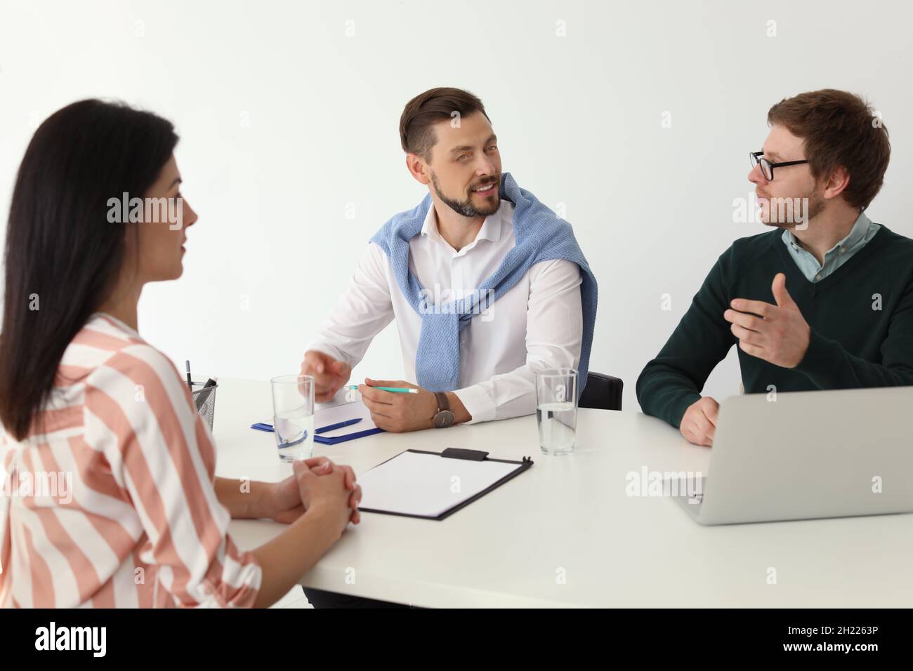 Human resources commission conducting job interview with applicant in ...