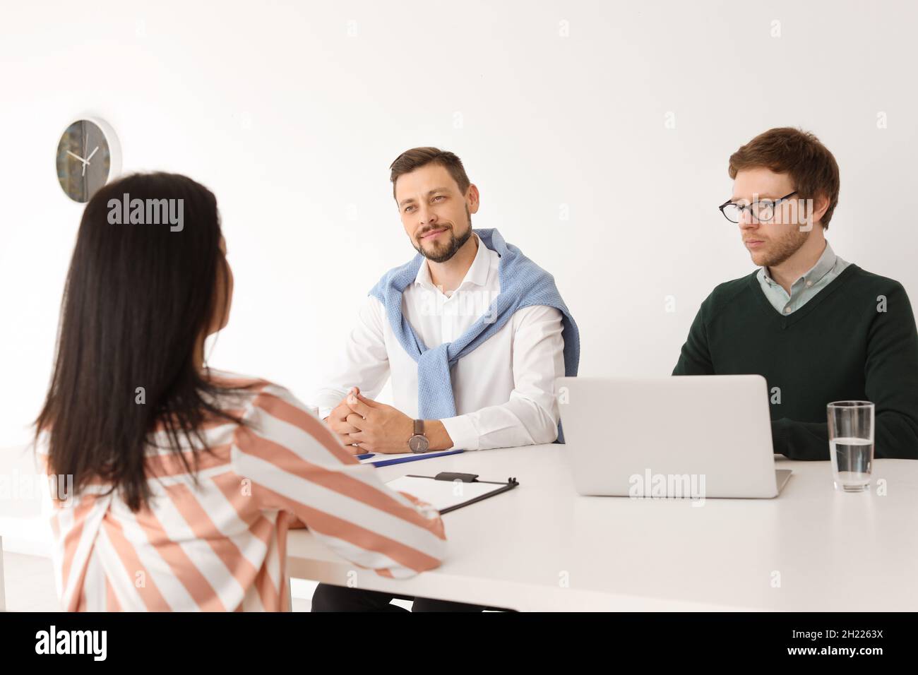 Human resources commission conducting job interview with applicant in ...