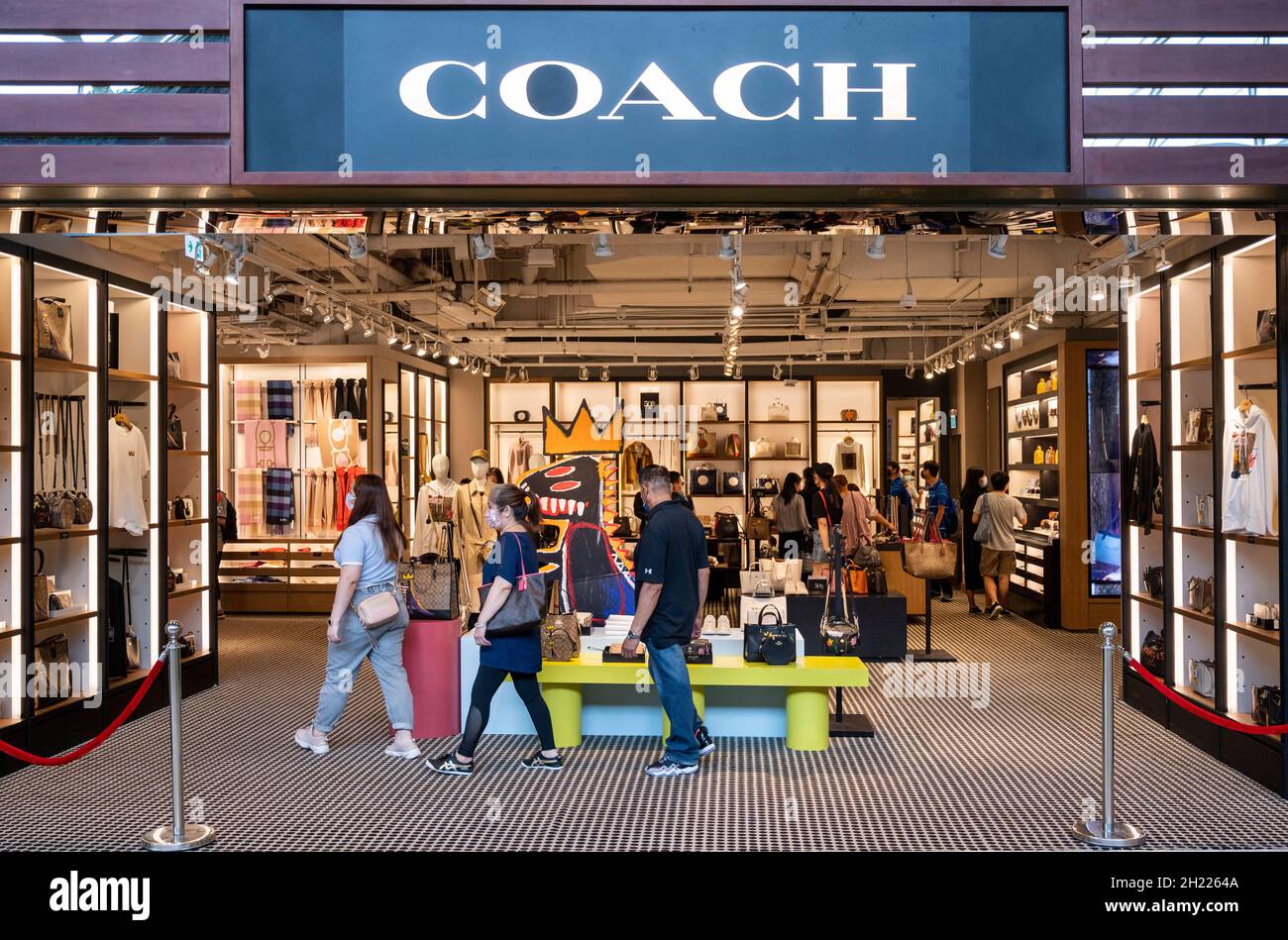 Shoppers are seen at the American multinational fashion and luxury ...