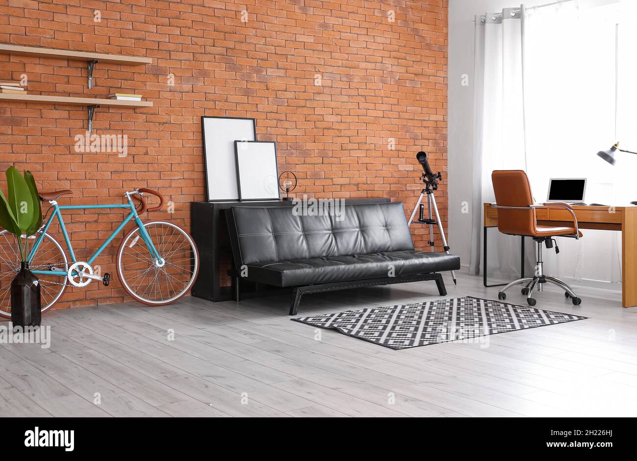 Comfortable living room interior with modern bicycle Stock Photo - Alamy