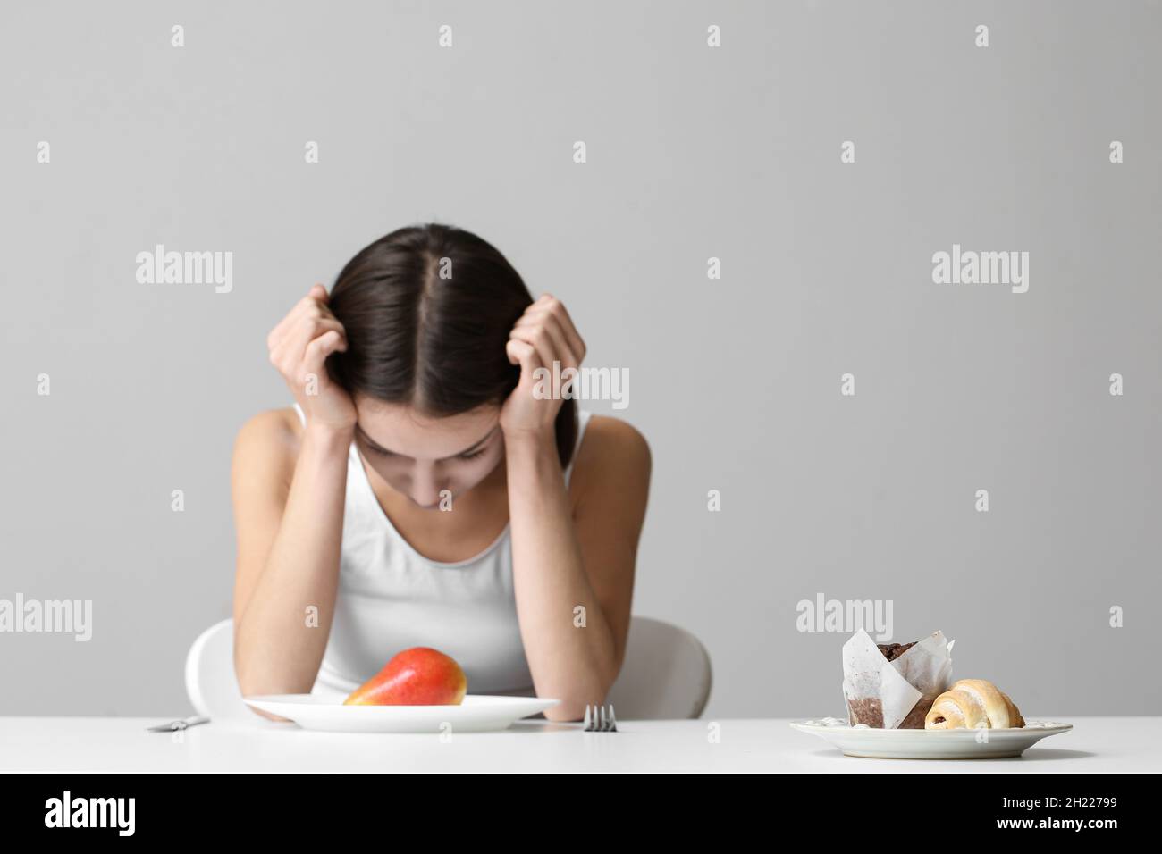 Woman refusing cake hi-res stock photography and images - Alamy
