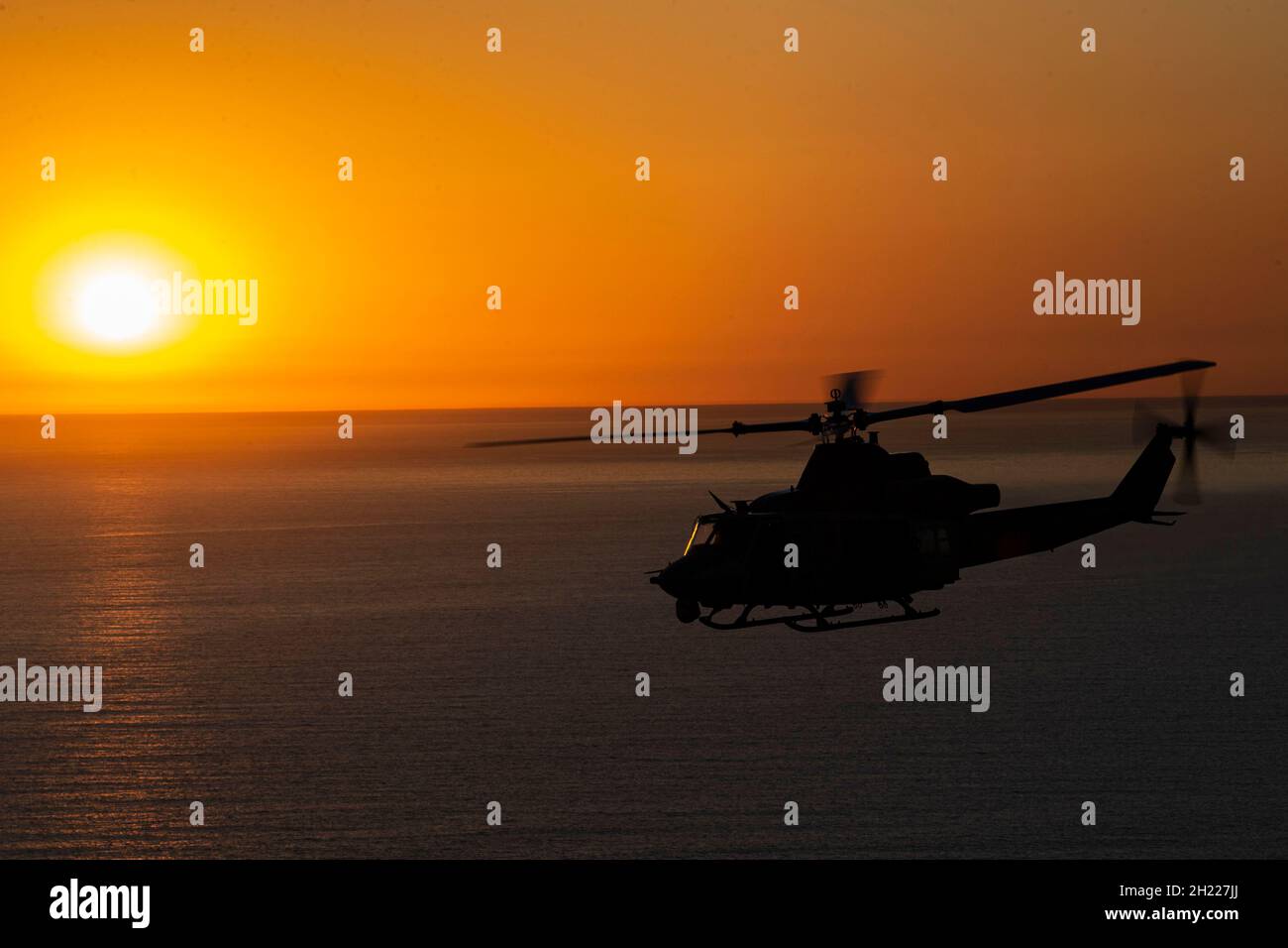 A U.S. Marine UH-1Y Venom Helicopter with Marine Light Attack ...