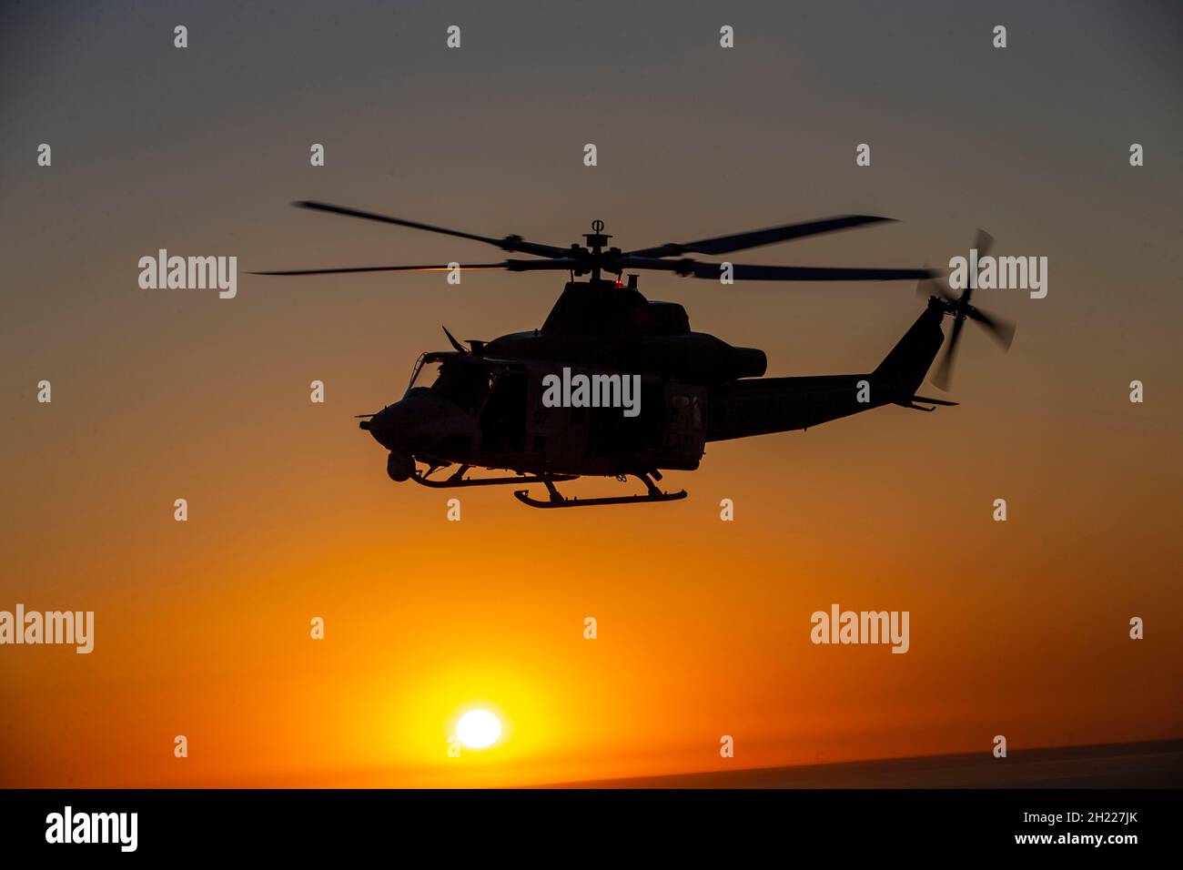 A U.S. Marine UH-1Y Venom Helicopter with Marine Light Attack ...