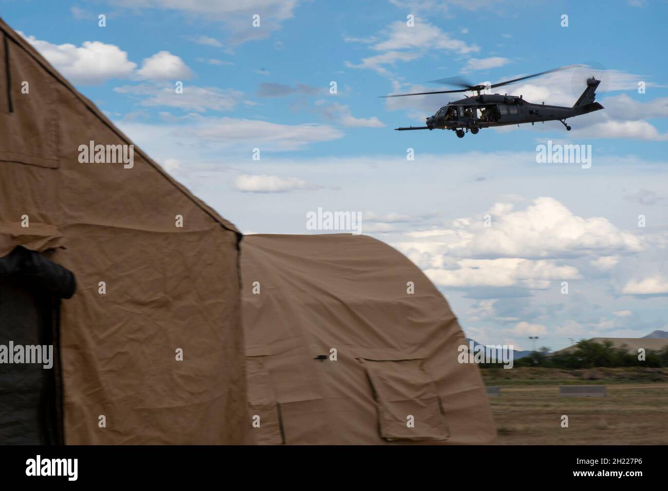 A U.S. Air Force HH-60G Pavehawk lands on Sunglow City during Exercise ...