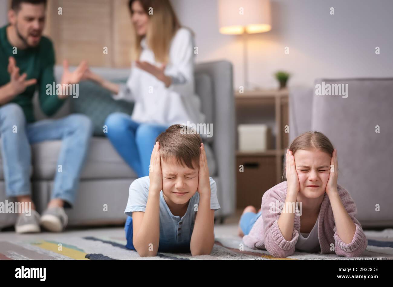 Brother sister arguing mother hi-res stock photography and images - Alamy