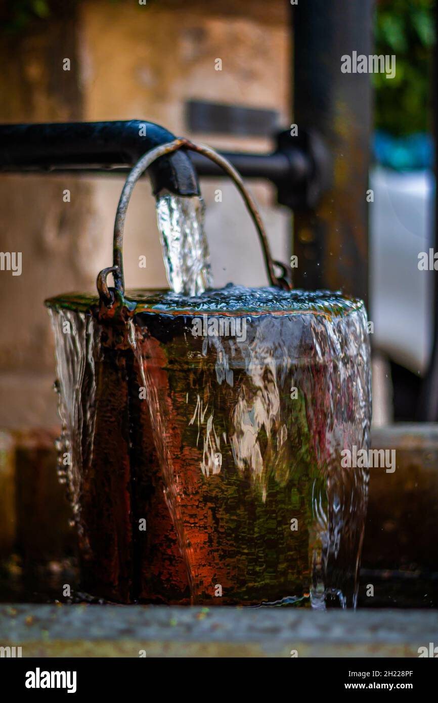 Tap to fill bucket hi-res stock photography and images - Alamy