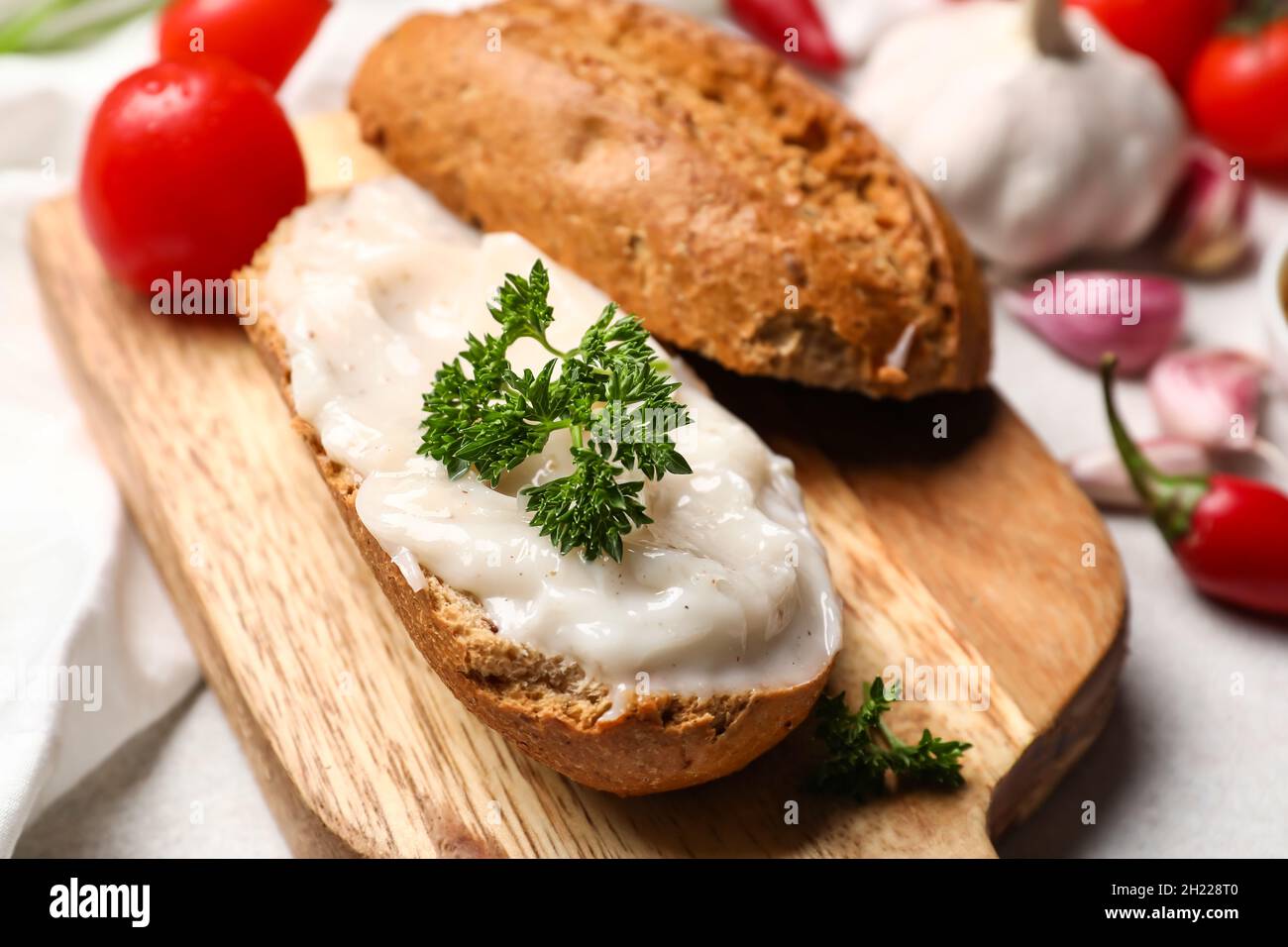 Bread with lard spread on white background Stock Photo - Alamy