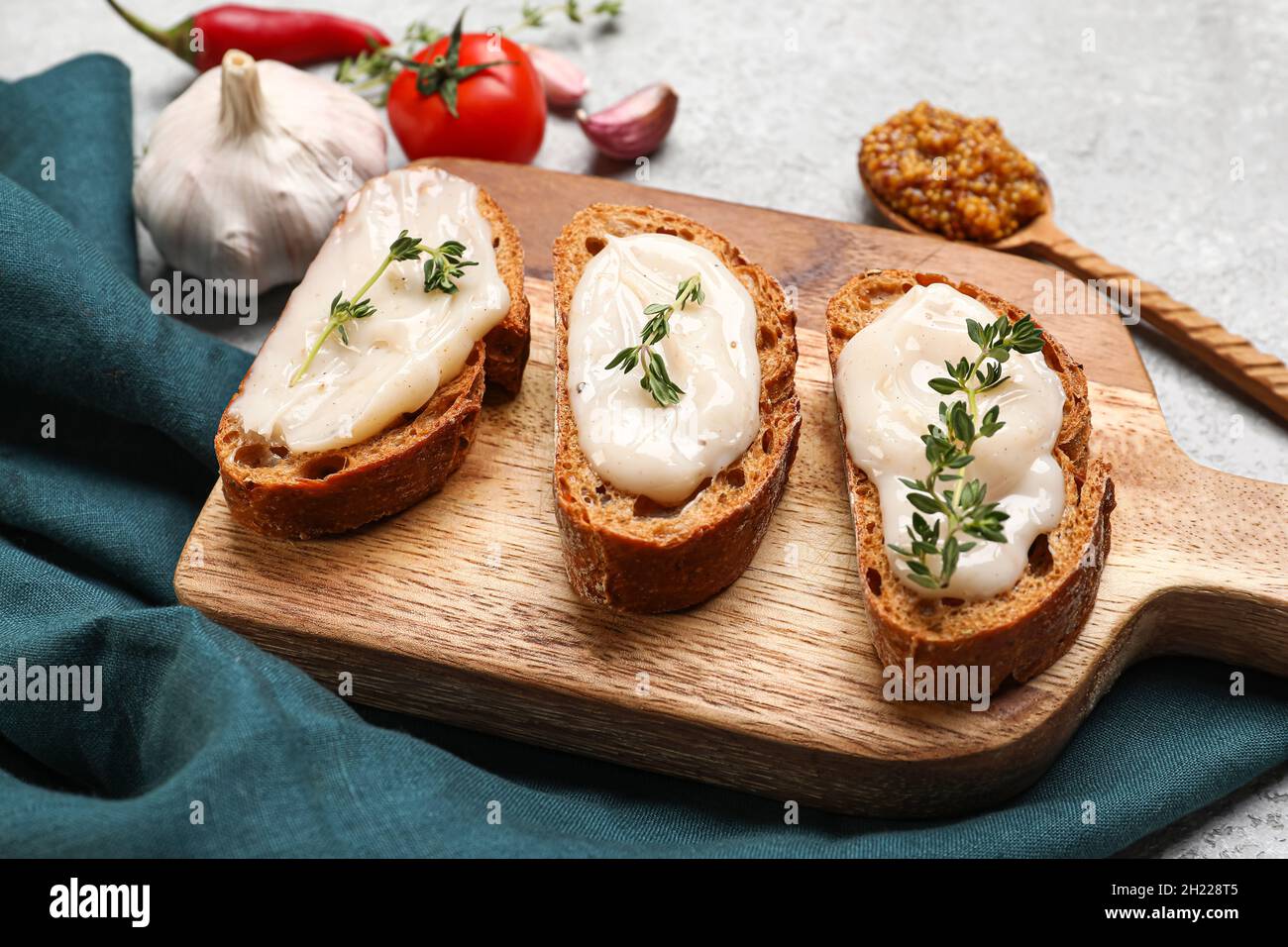 Pieces of bread with lard spread on light background Stock Photo - Alamy