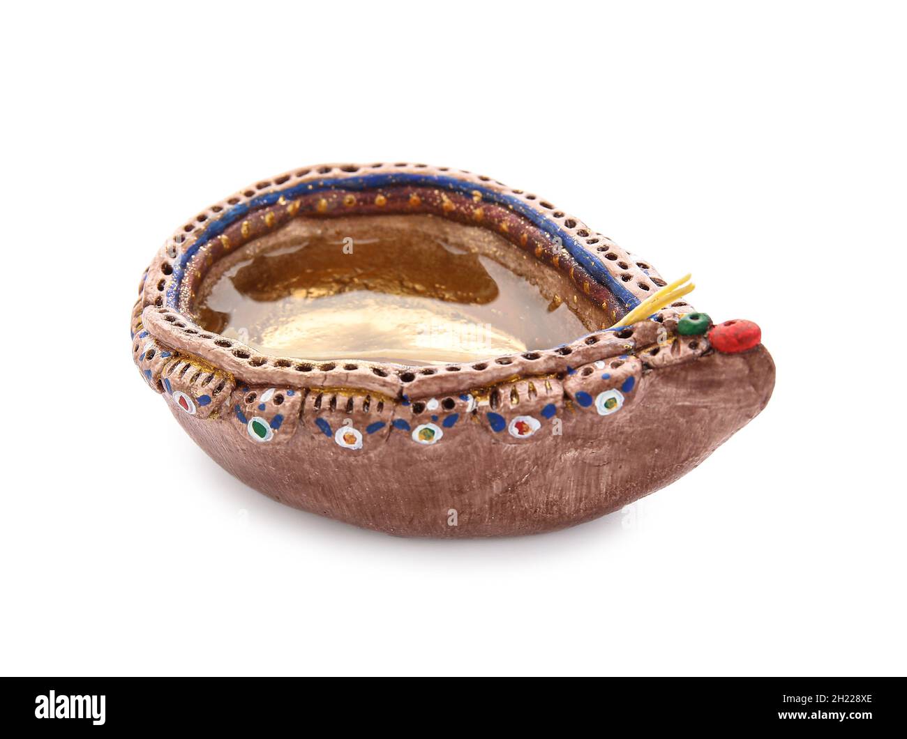 Diya lamp for Diwali on white background Stock Photo - Alamy
