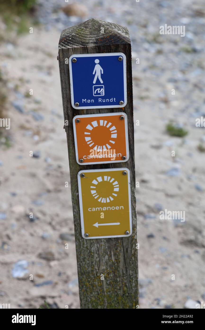 Vertical shot of trail signs on a pole outside Stock Photo - Alamy
