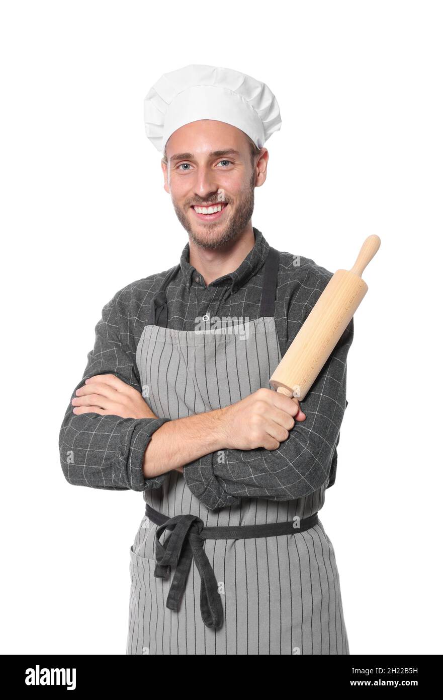 Professional chef holding rolling pin on white background Stock Photo ...