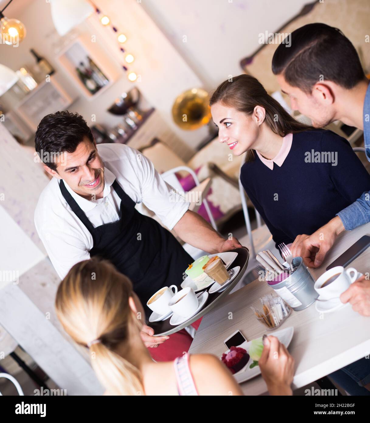 Woman ordering male waiter hi-res stock photography and images - Alamy