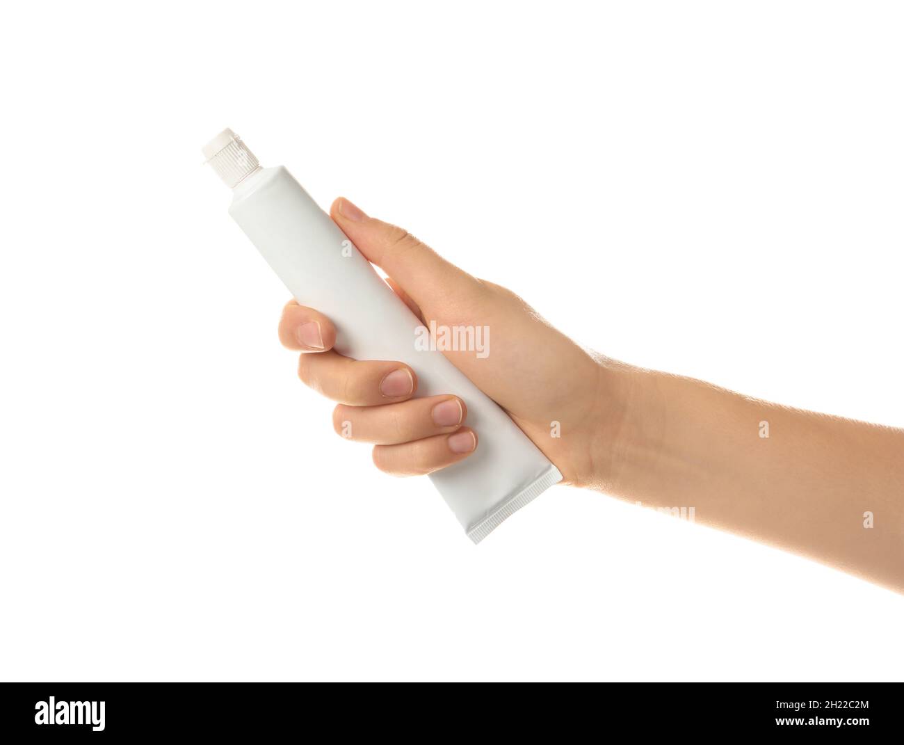 Woman holding toothpaste against white background. Dental care Stock ...