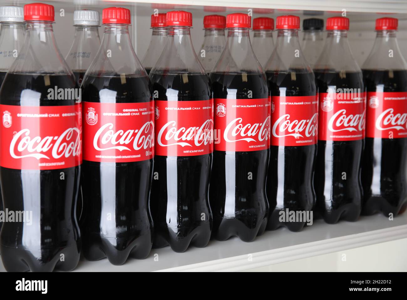 MYKOLAIV, UKRAINE - NOVEMBER 14, 2018: Many bottles of Coca-Cola on ...