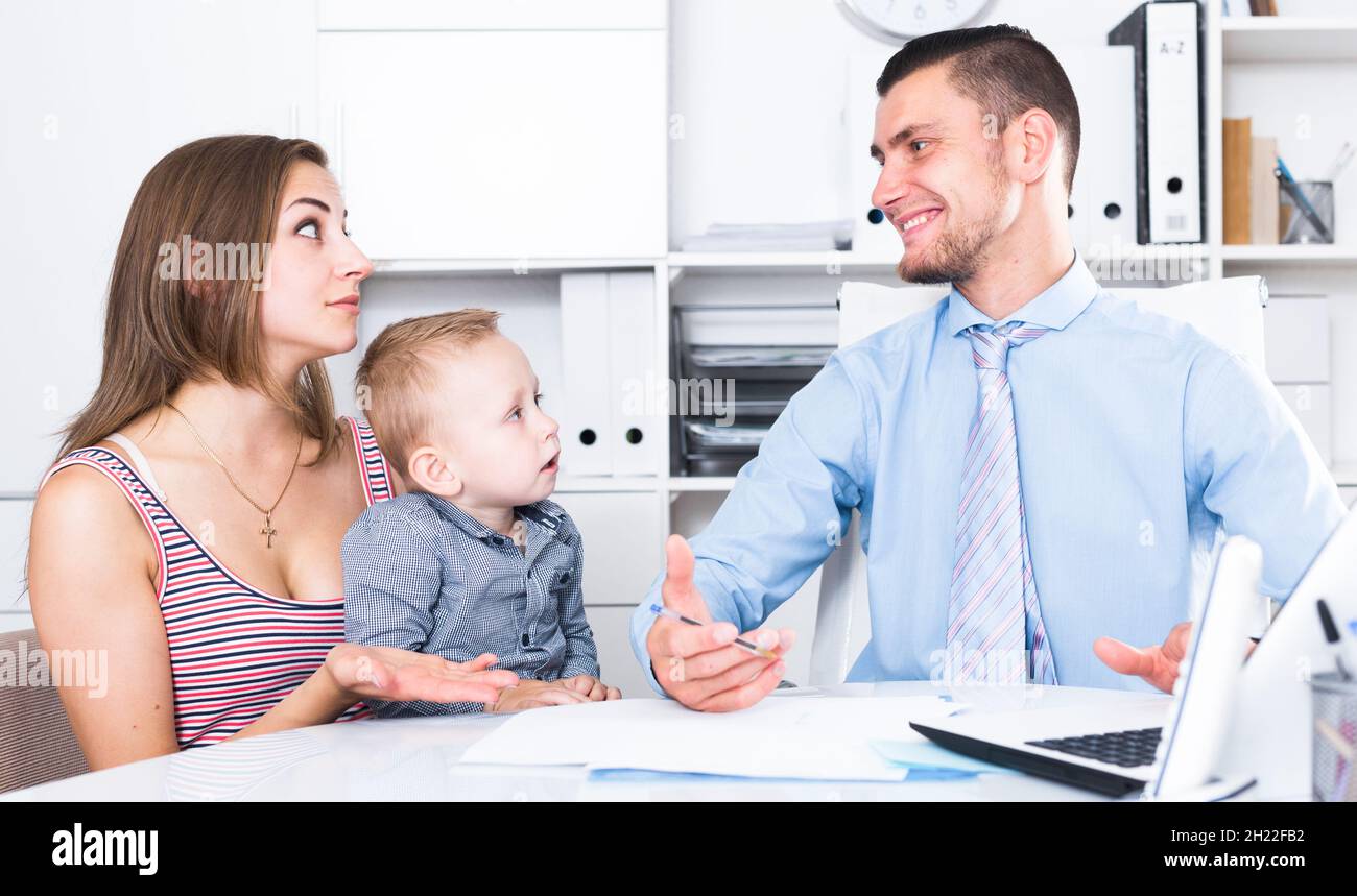 Adult male lawyer talking with young woman Stock Photo - Alamy