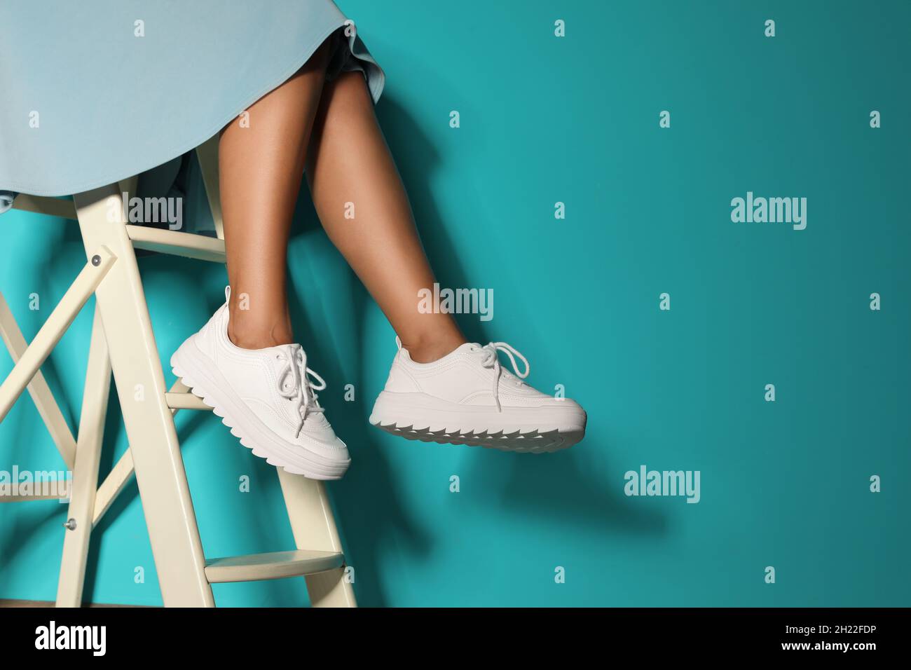Feet on ladder woman hi-res stock photography and images - Alamy