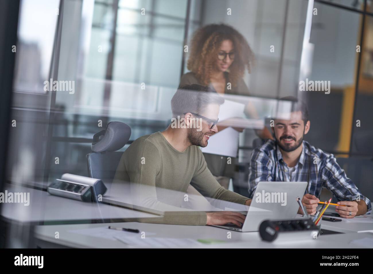 Happy employees starting work with new clients Stock Photo - Alamy