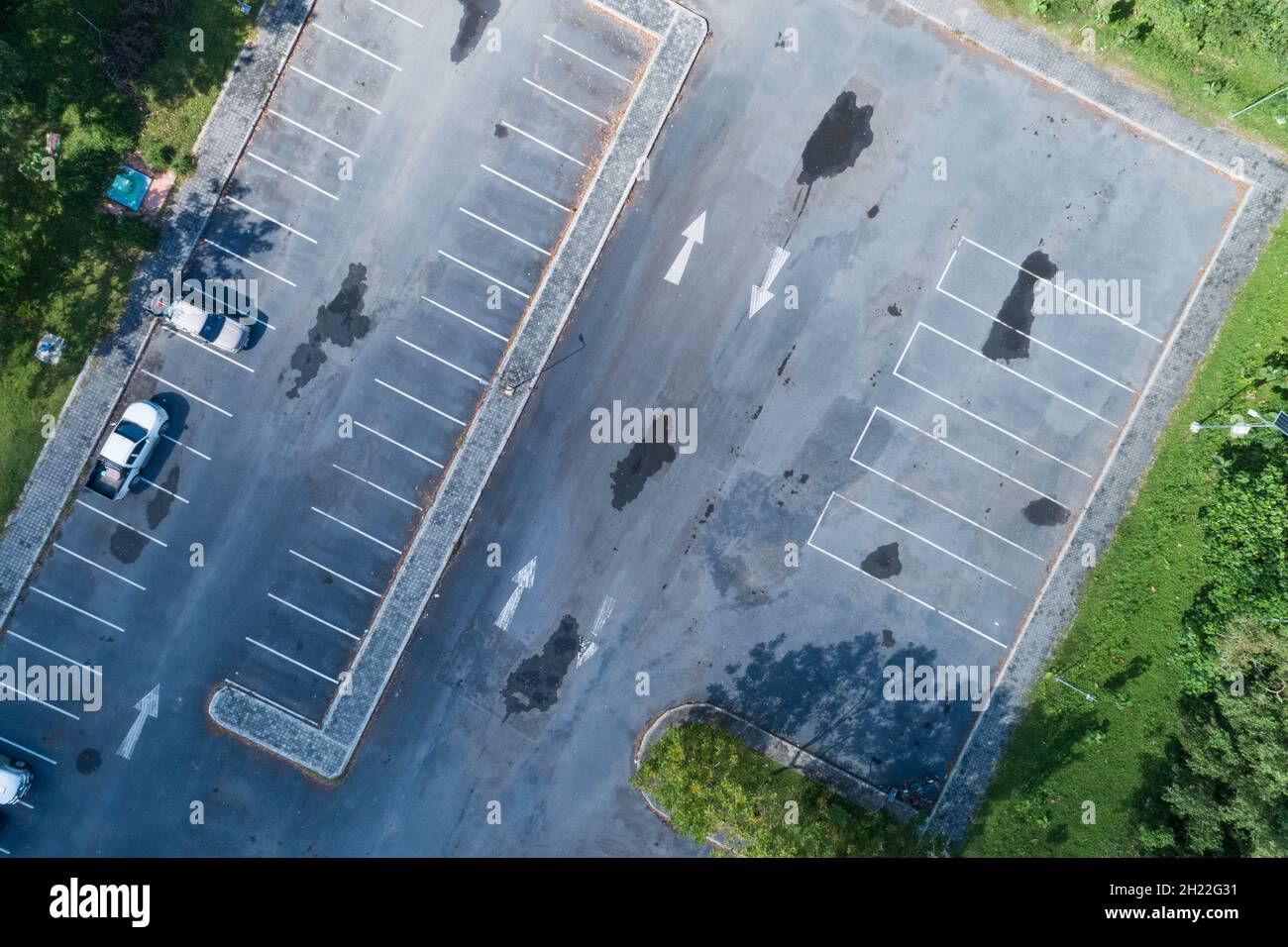 Aerial view top down of car parking lot with white line of traffic sign ...