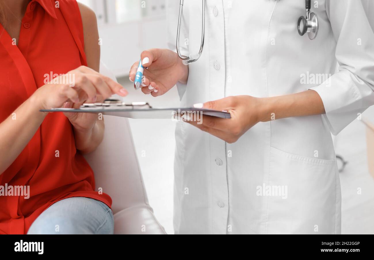 Patient having appointment with doctor in hospital Stock Photo - Alamy