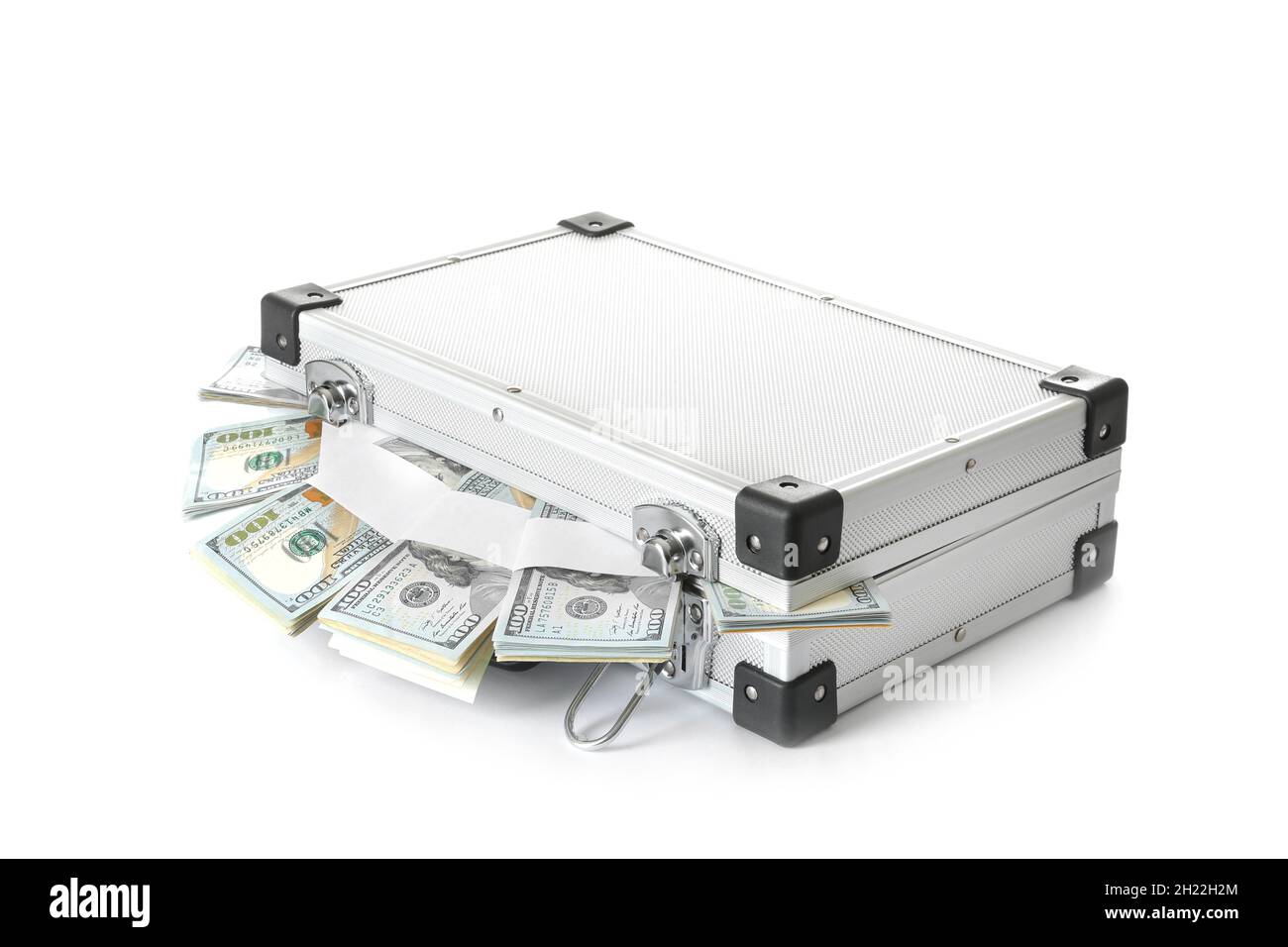Hard case full of money on white background Stock Photo - Alamy