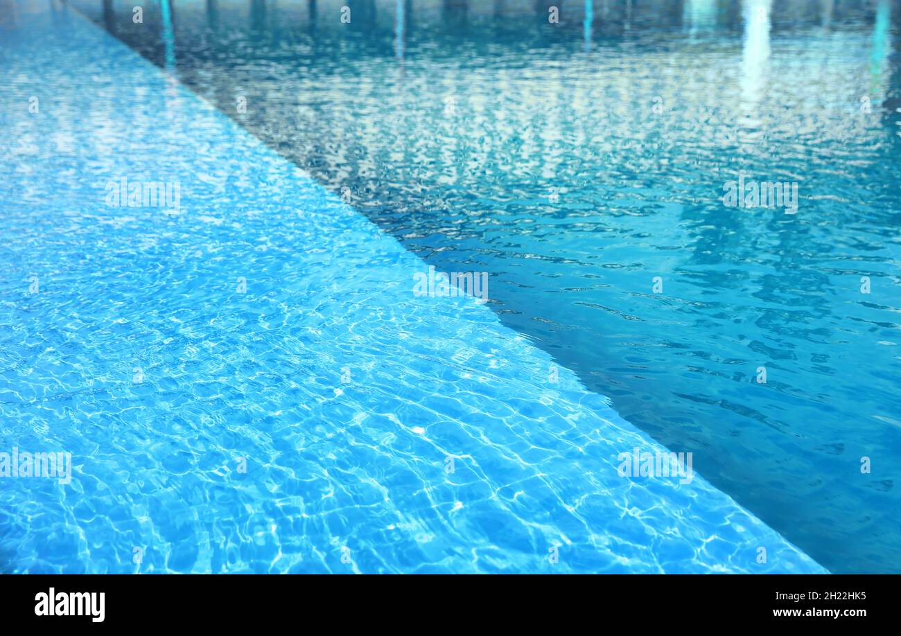Clear refreshing water in swimming pool Stock Photo - Alamy