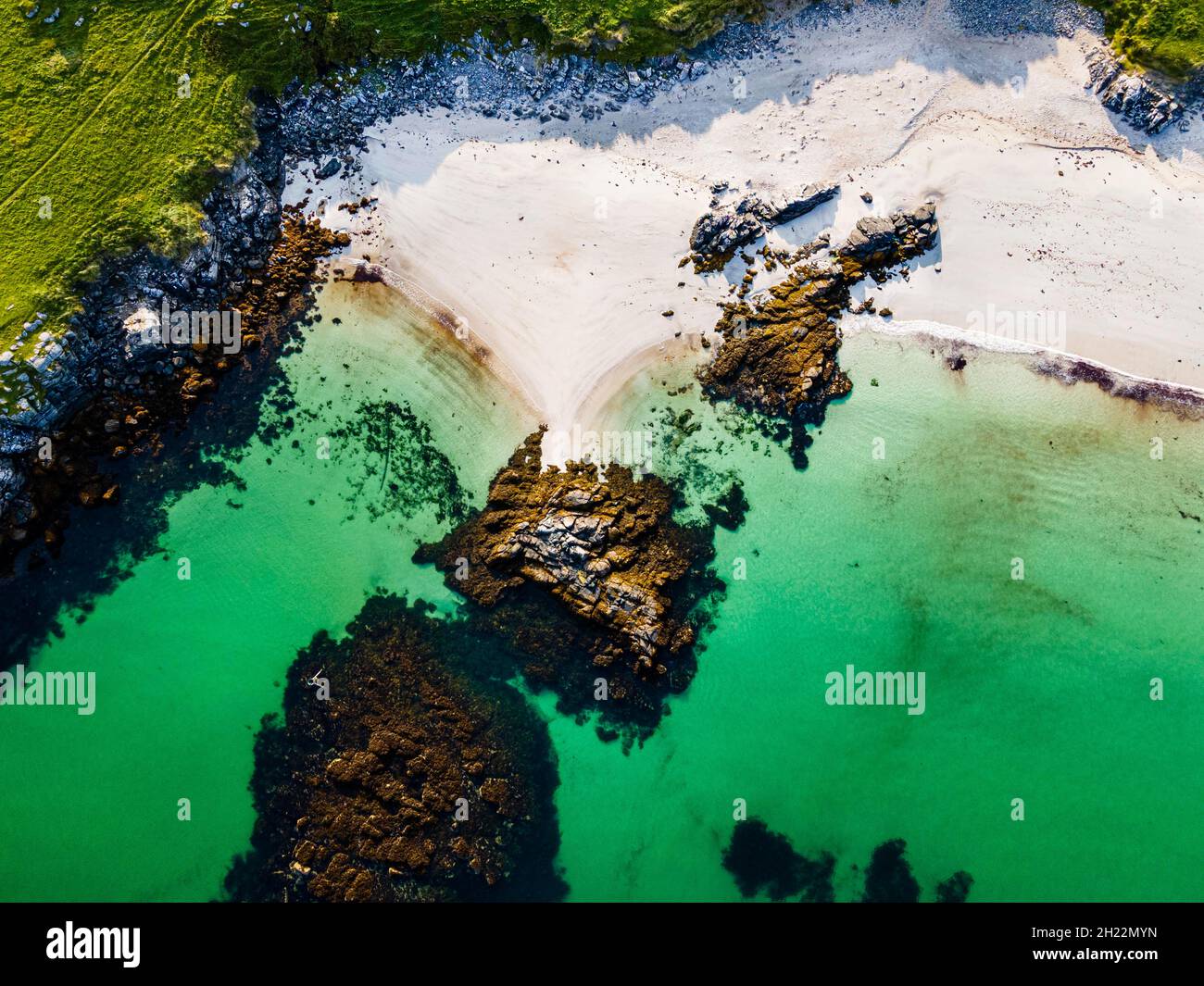 Aerial of white sand and turquoise water at Bosta Beach, Isle of Lewis ...