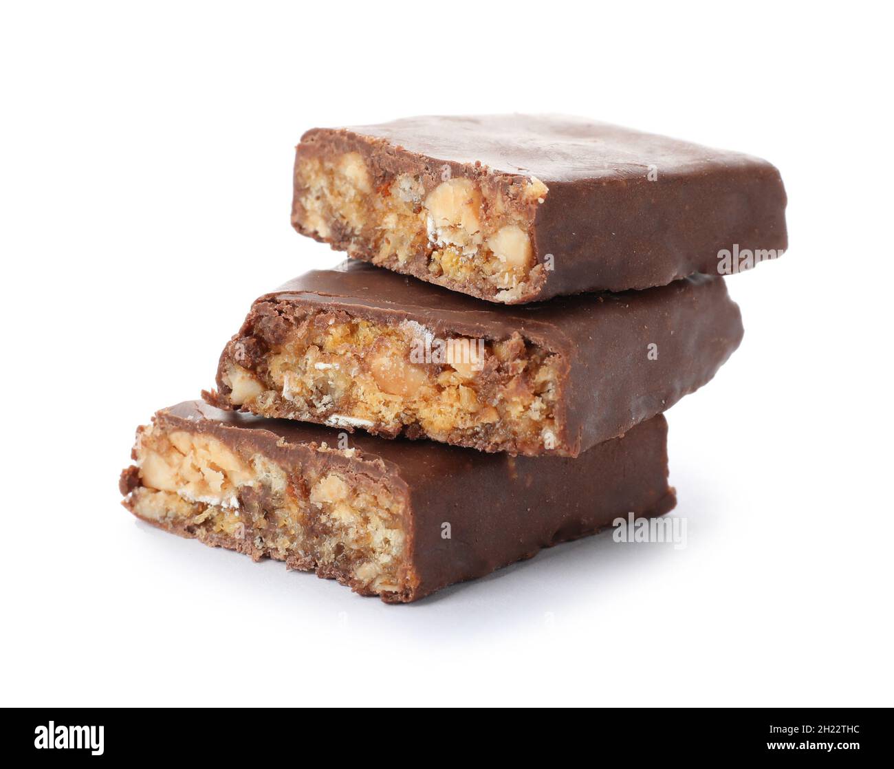 Pieces of tasty glazed protein bar on white background Stock Photo - Alamy