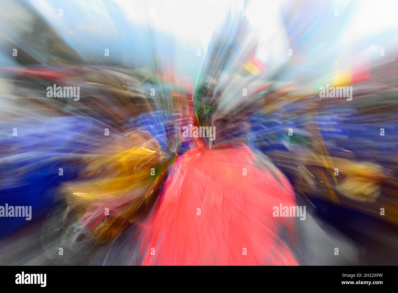 Dance group in traditional costumes during a parade, distorted, El Alto ...