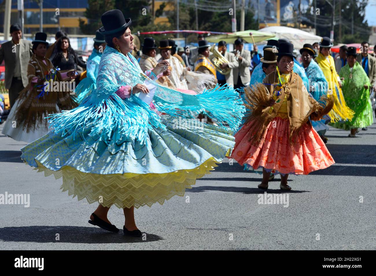 Dance group in traditional costumes at a parade, El Alto, Department of ...