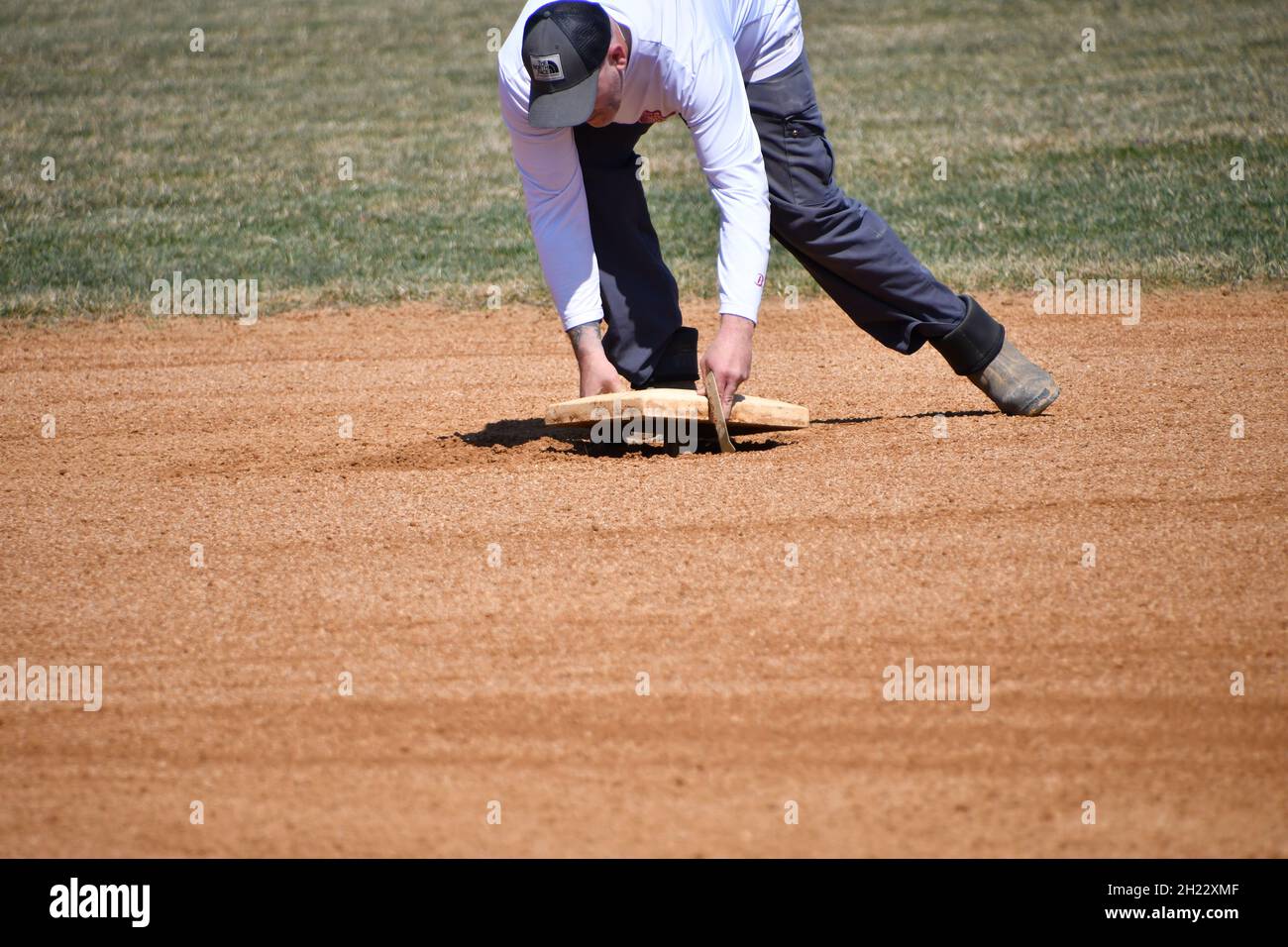 Prepping the baseball field Stock Photo - Alamy