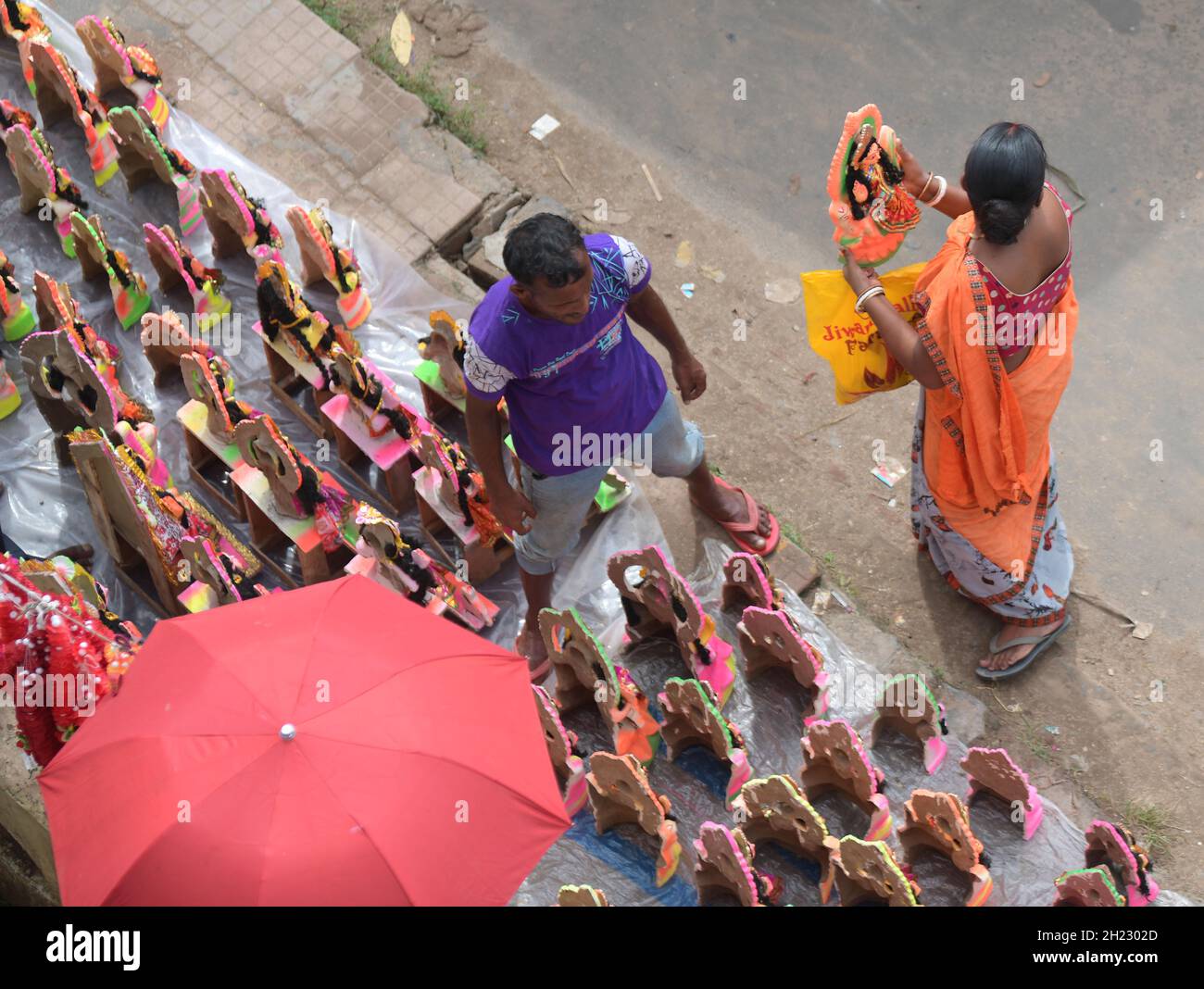 Agartala, Tripura, India, 20th October 2021. People buying statues of ...