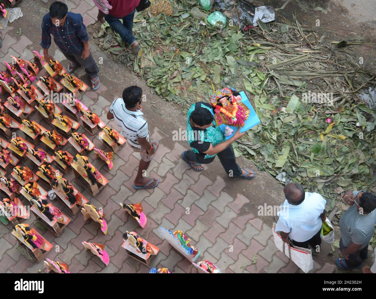 Agartala, Tripura, India, 20th October 2021. People buying statues of ...
