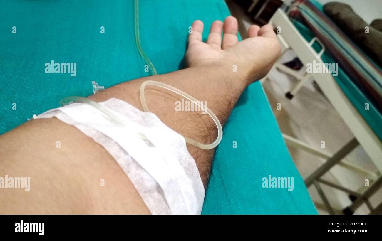 Hand with drip hi-res stock photography and images - Alamy