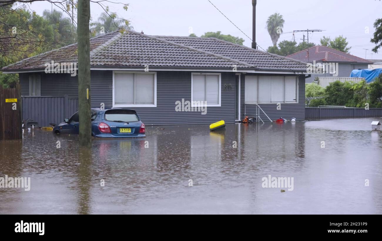 WINDSOR, AUSTRALIA - MAR, 23, 2021: front view of a car and house at ...