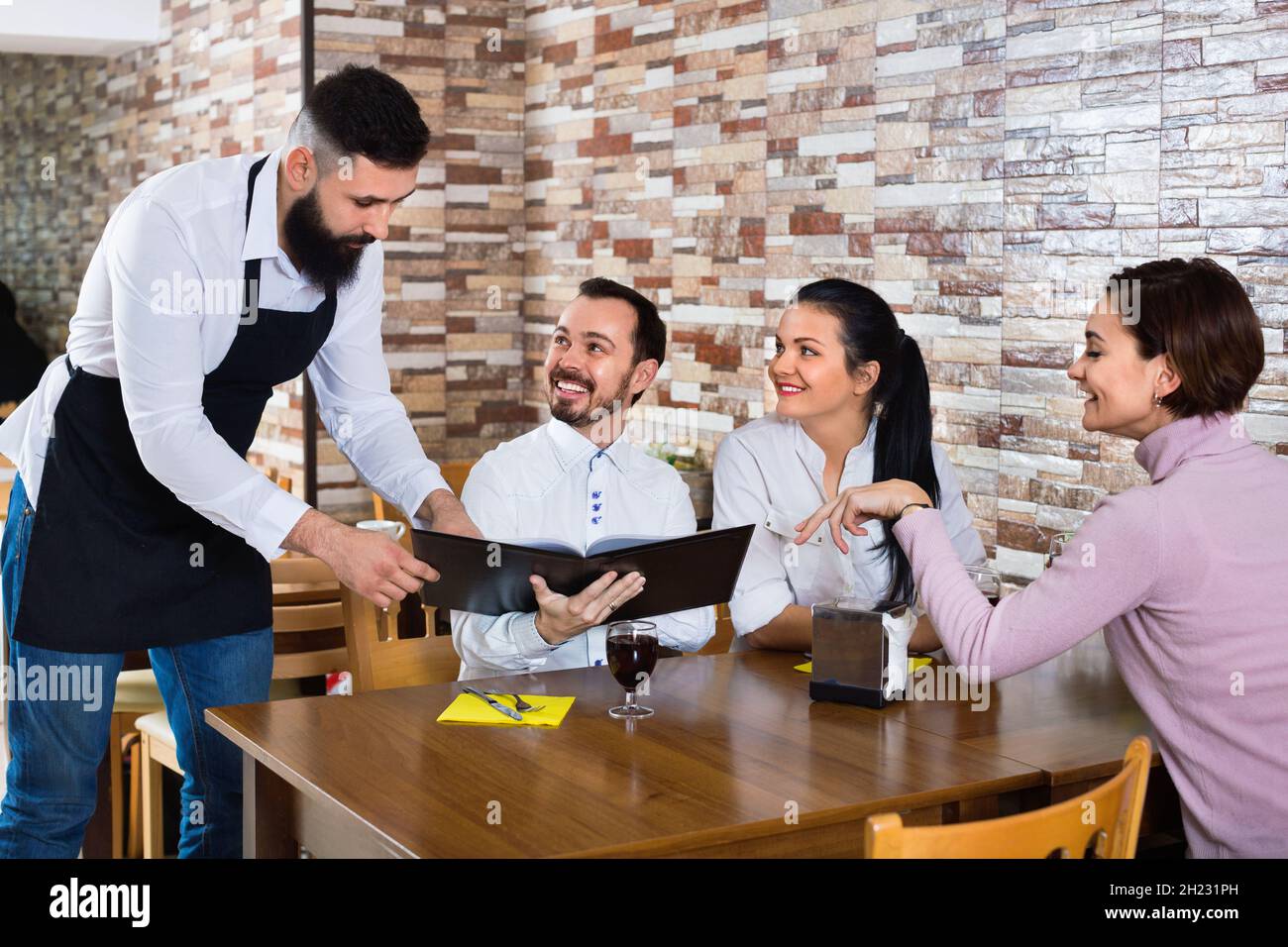 Waiter taking order restaurant table hi-res stock photography and ...