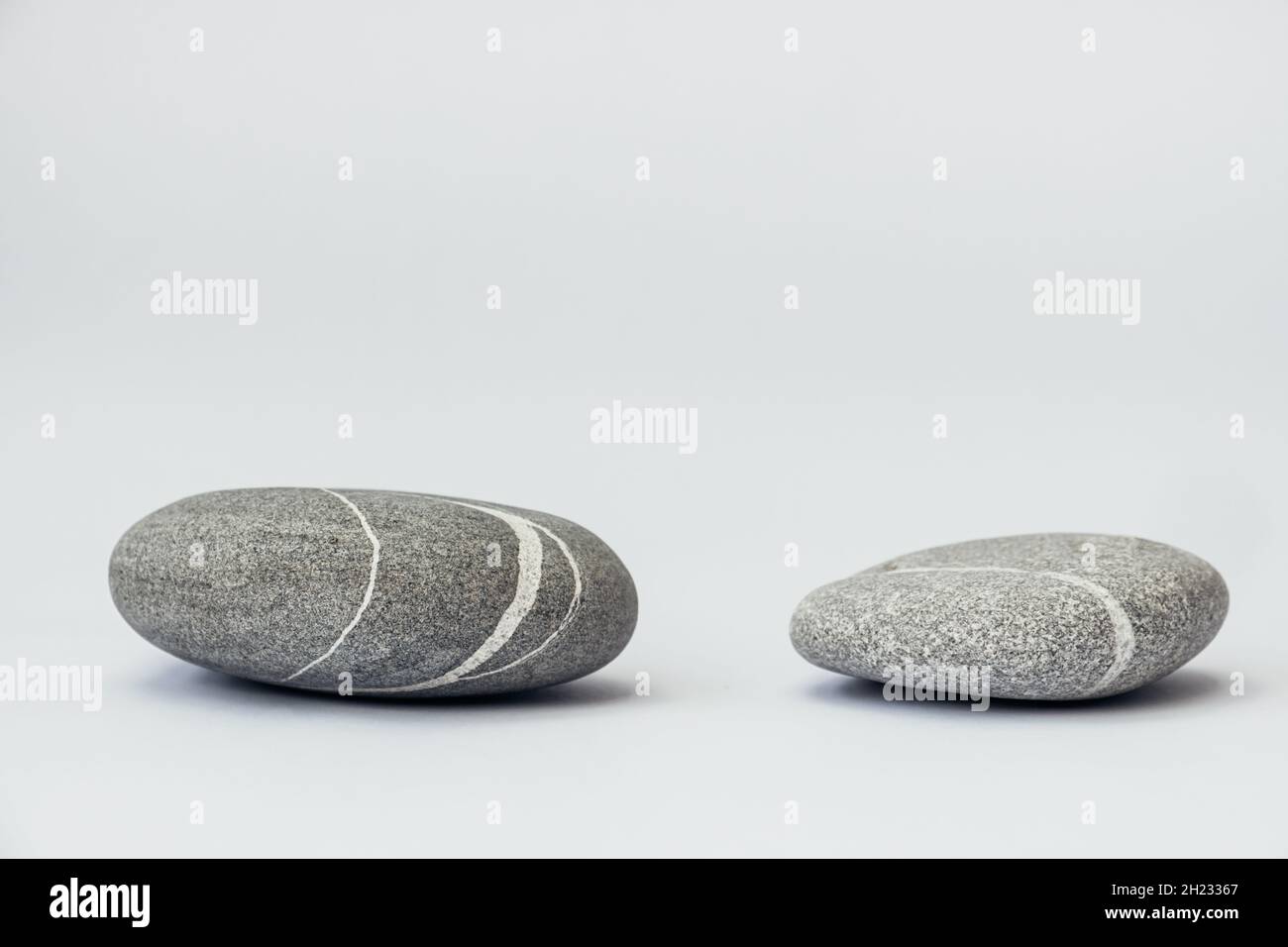 Stones is on the light background, simple poise stones. Purity harmony ...