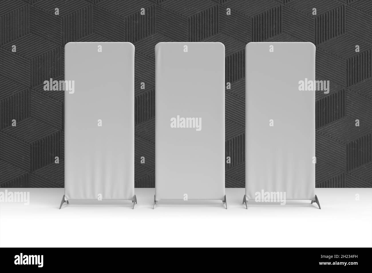 Wall Banner Sock systems in front of a black textured wall, side by ...