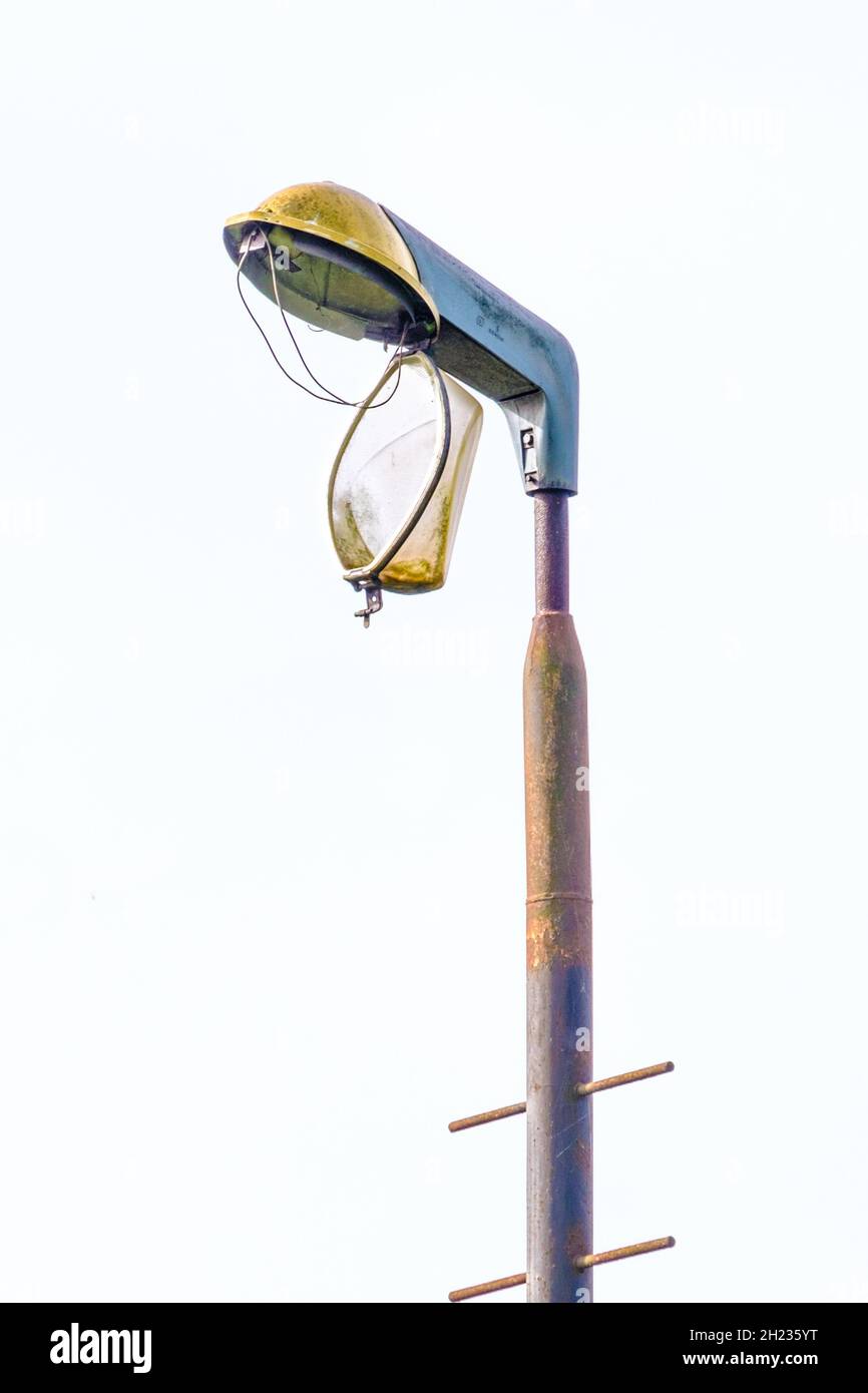 Old street light post isolated in the white background Stock Photo - Alamy