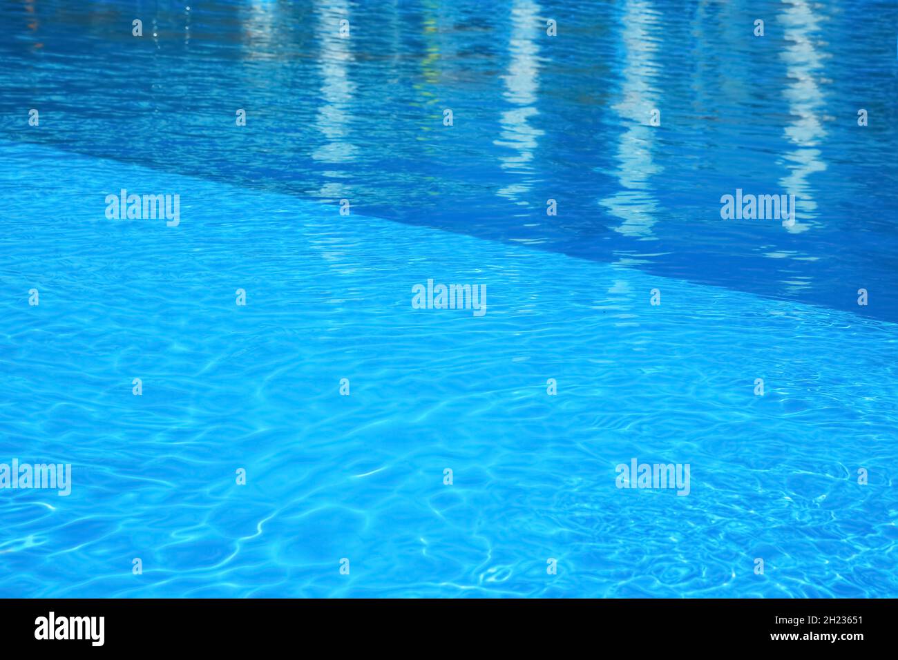 Clear refreshing water in swimming pool Stock Photo - Alamy
