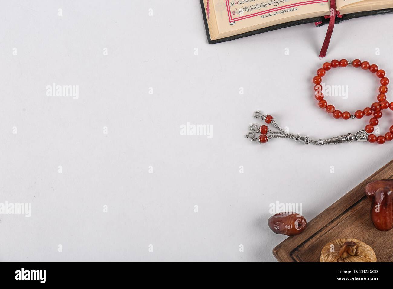 Flat lay composition with Muslim prayer beads, Quran and space for text ...