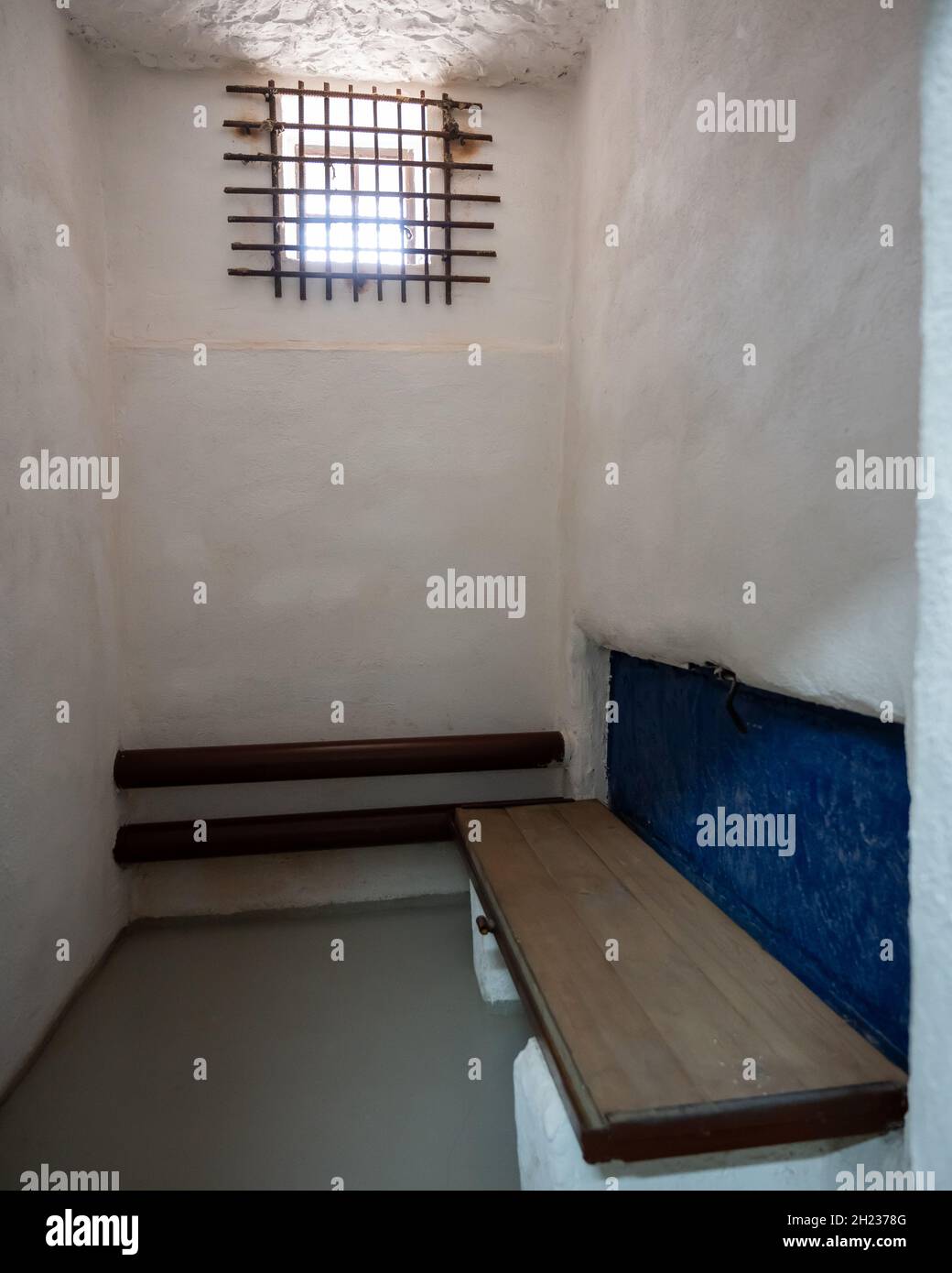 Empty loner prison cell with bars on the window Stock Photo - Alamy