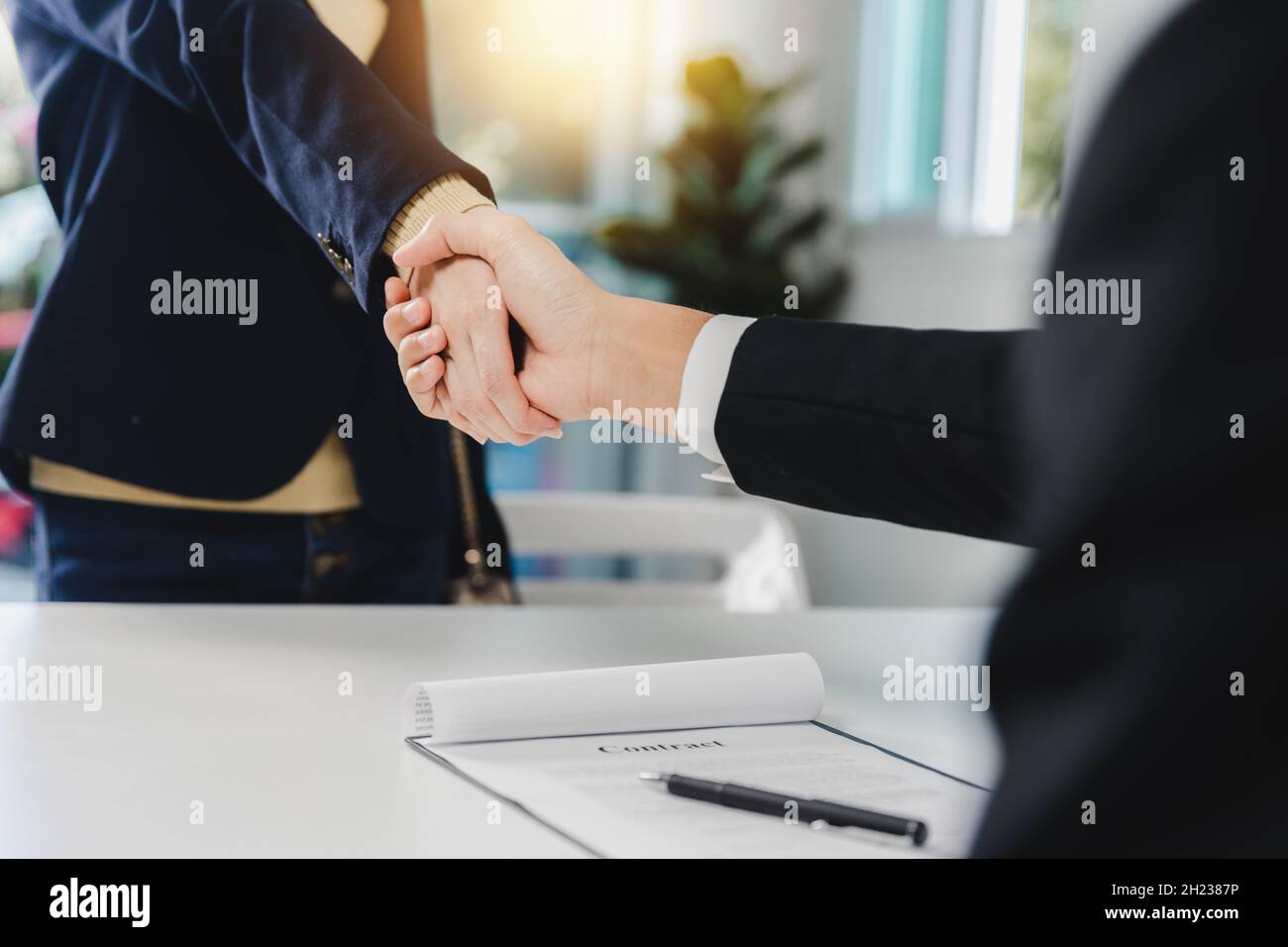 success deal and negotiate concept, close up hand shake of two ...