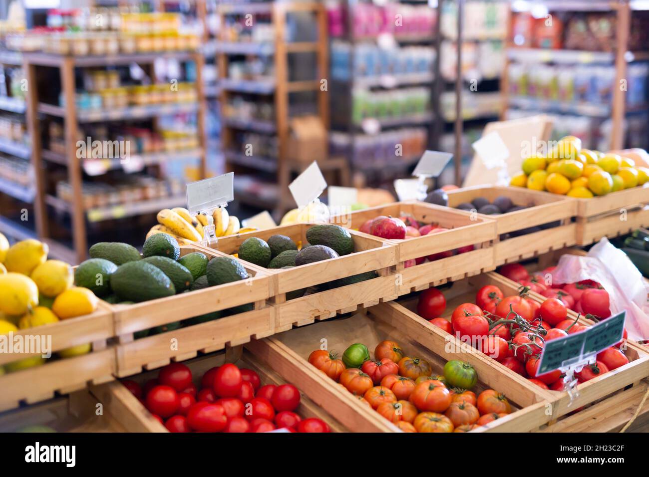 Fresh vegetables and fruits on counter in grocery supermarket Stock ...