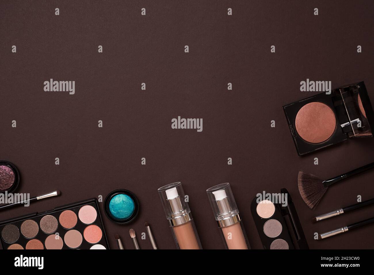 The women's cosmetics set on a brown background, modern woman Stock ...