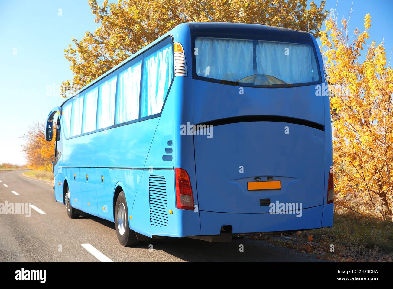 Modern blue bus on road. Passenger transportation Stock Photo - Alamy