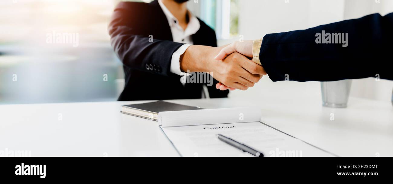 Success negotiate and hand shake Stock Photo - Alamy