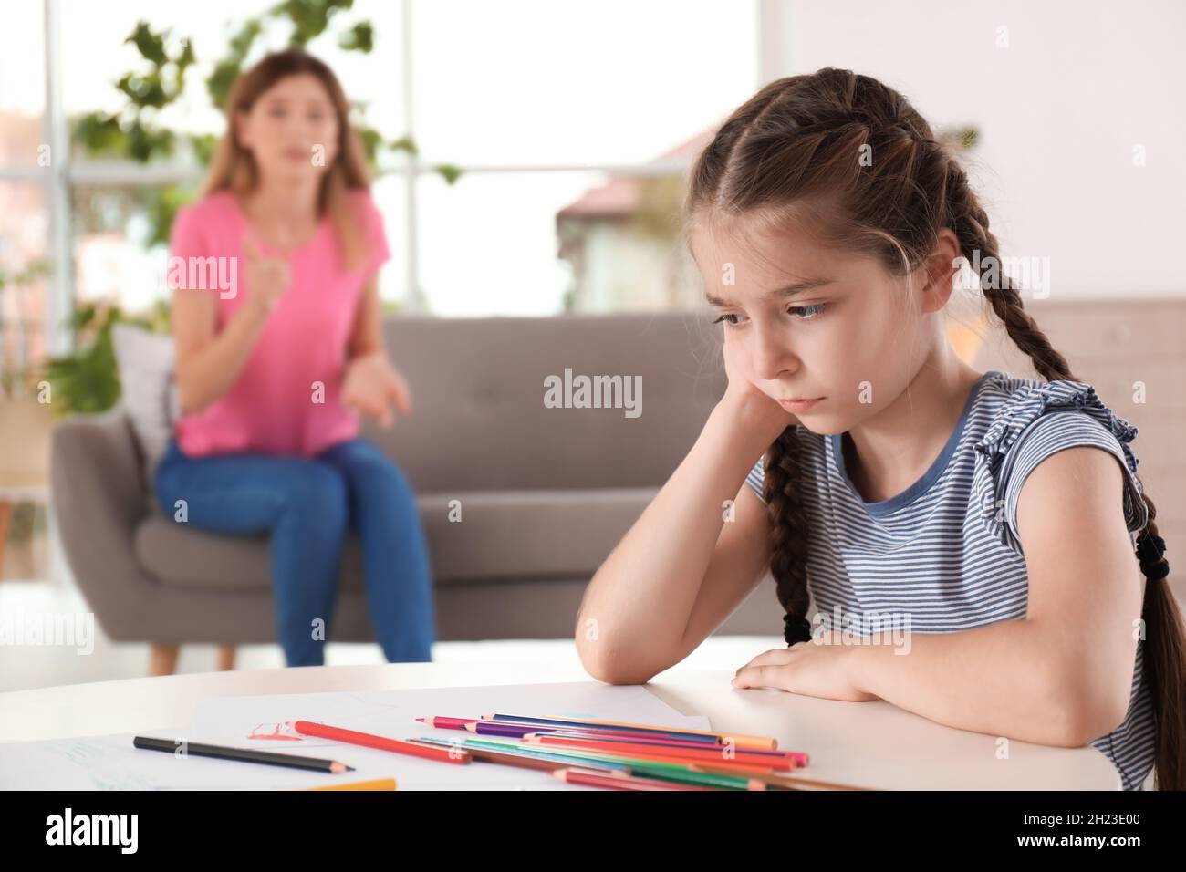 Mother scolding child at home. Family relationships Stock Photo - Alamy