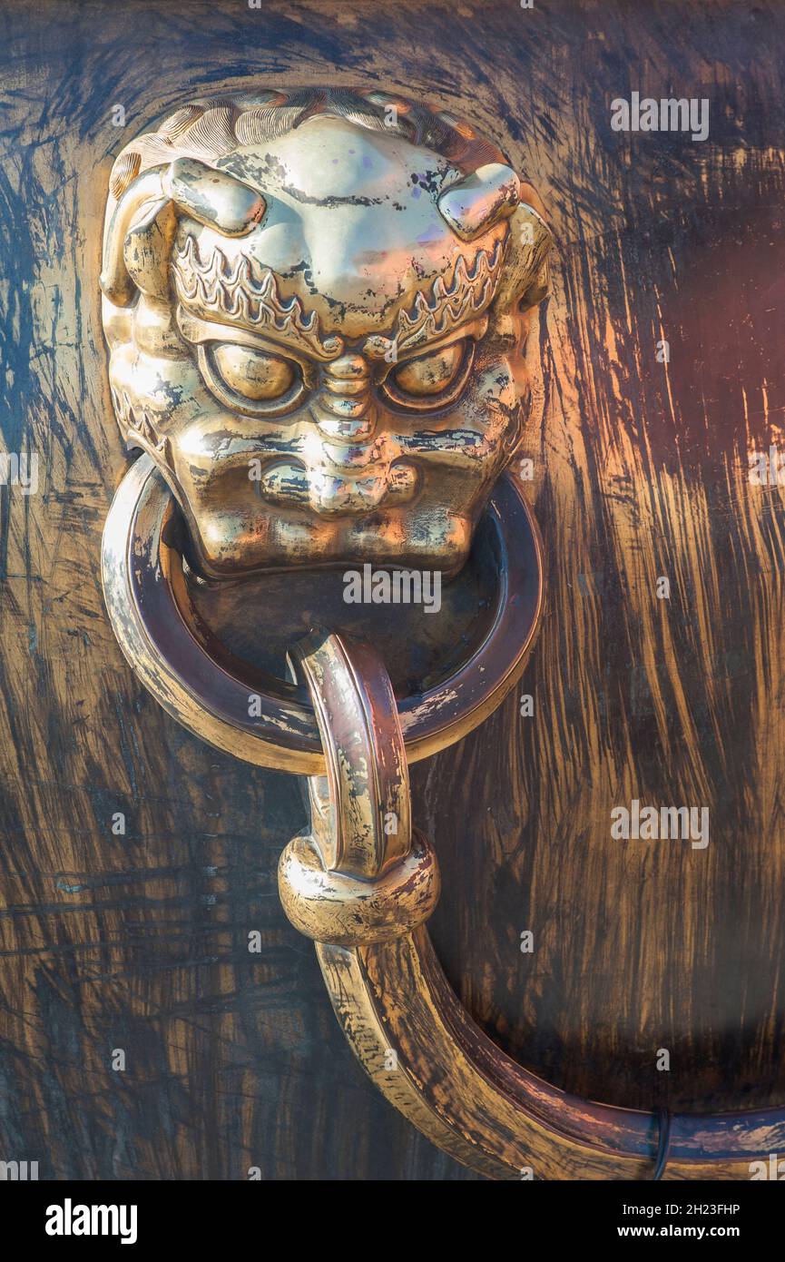 The bronze handle of the water vat in Forbidden City Stock Photo - Alamy
